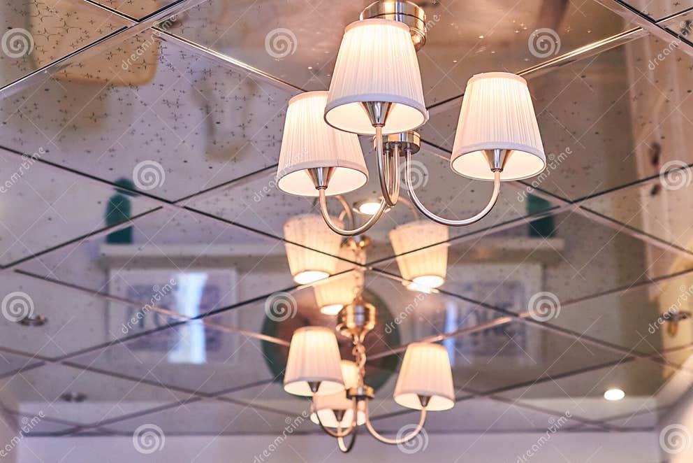 Interior Design with Reflection of Light Lamps on the Ceiling. Home ...