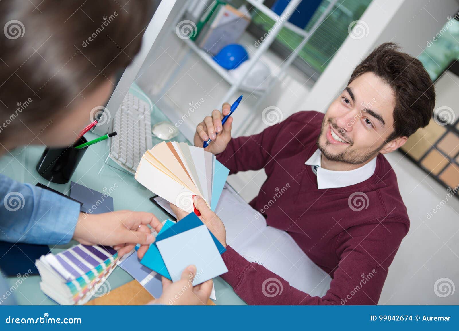 Interior Designer Smiling To Client during Meeting Stock Photo - Image ...