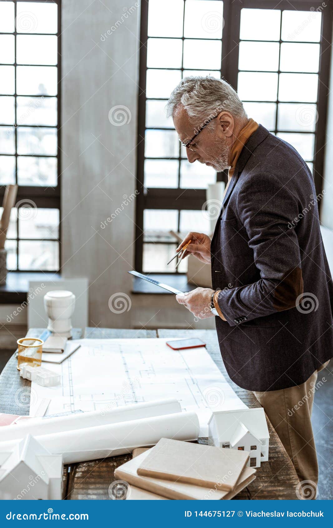 Interior Designer Using Ruler and Compasses Working on Sketches Stock ...