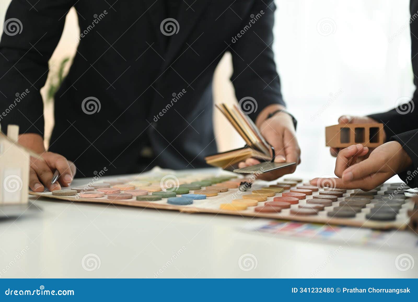 Interior Designers Brainstorming Selecting Color Samples from a Vibrant ...