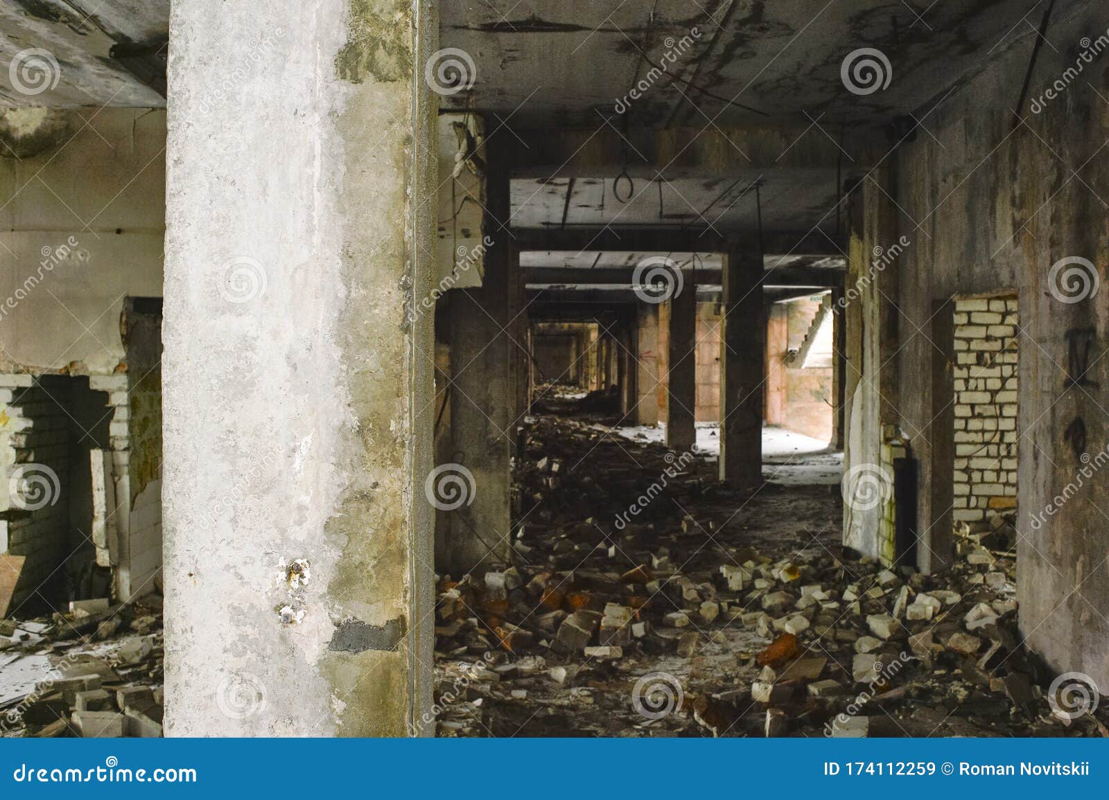 The Interior of a Destroyed Building with a Pile of Concrete Rubble and ...