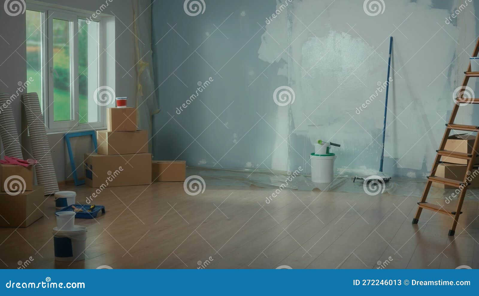 Interior of an Empty Apartment during Renovation. a Stepladder, Stacks ...