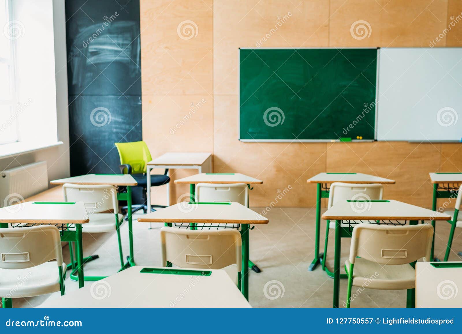 Interior of Empty Modern Classroom with Blank Chalkboard at School ...