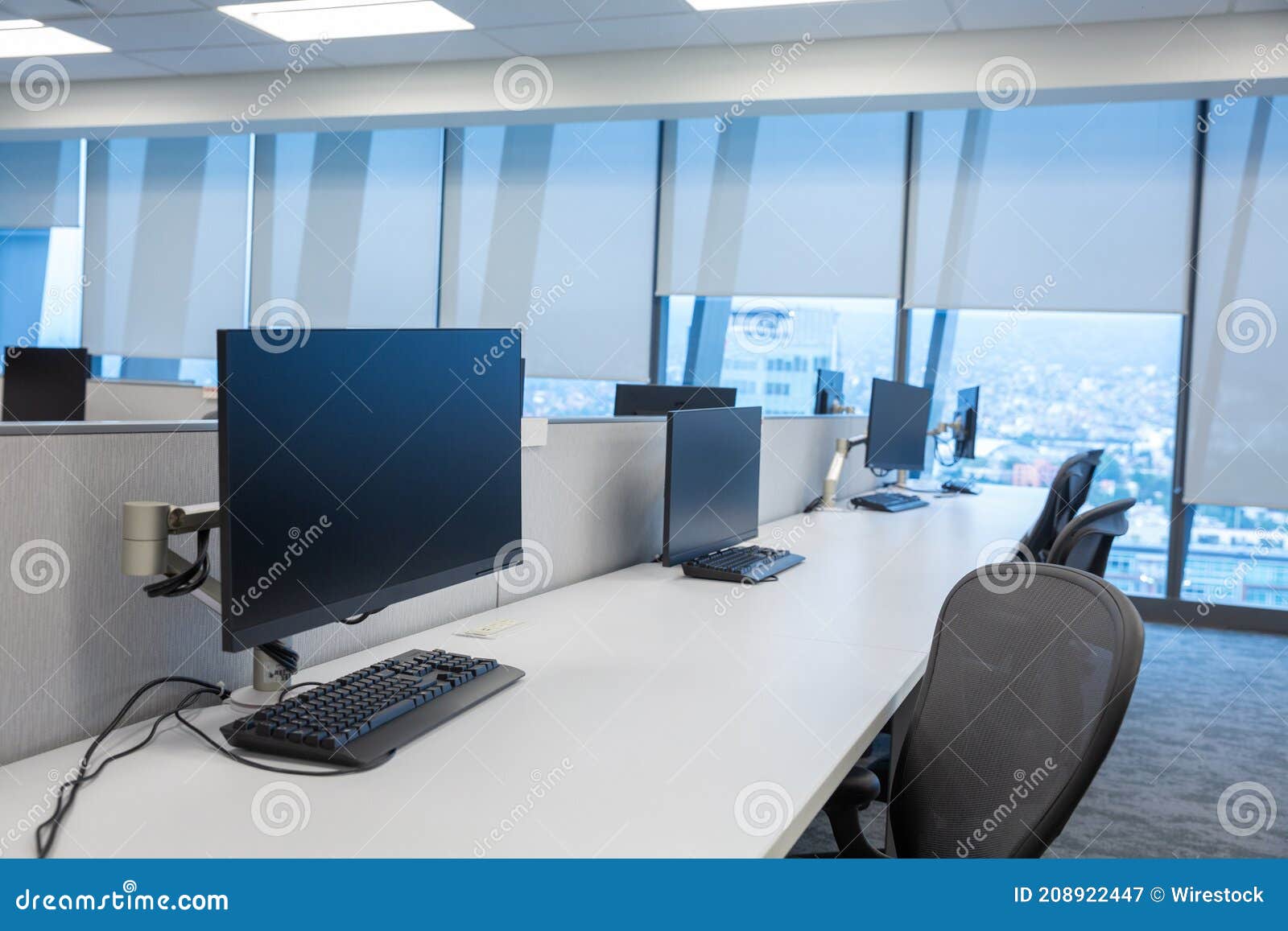 Interior of an Empty Modern Office with Computers on Desks during Covid ...