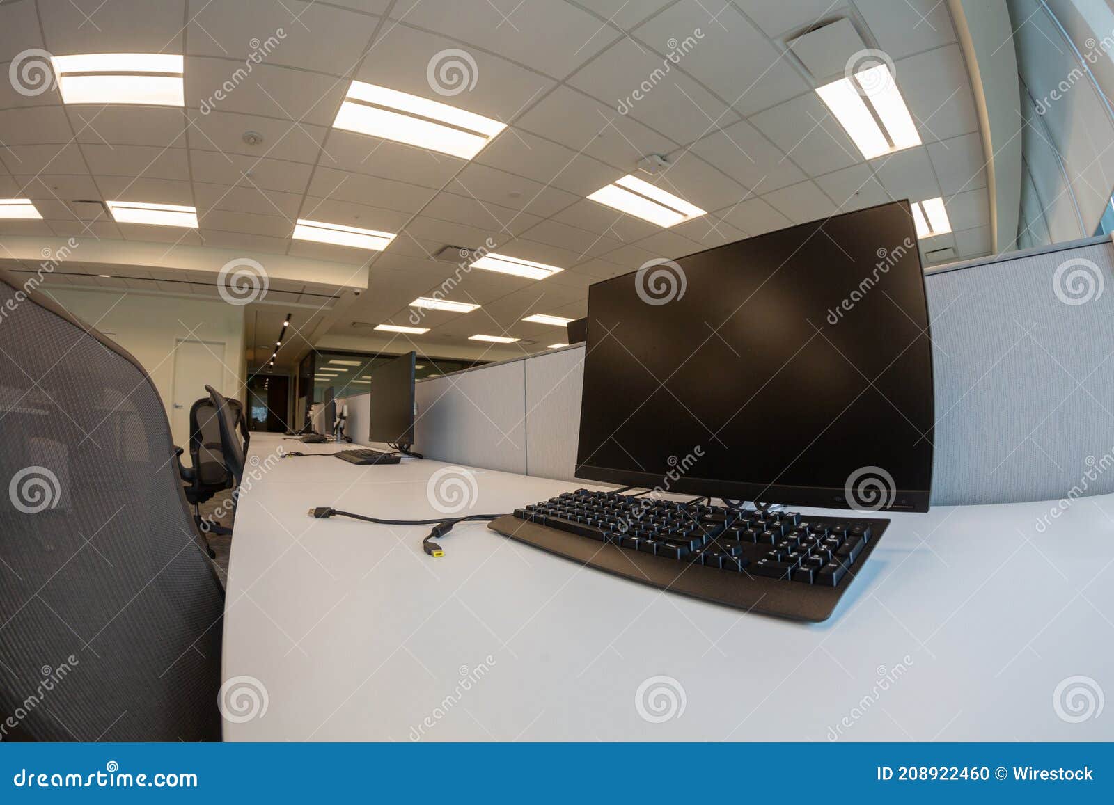 Interior of an Empty Modern Office with Desks and Computers during the ...