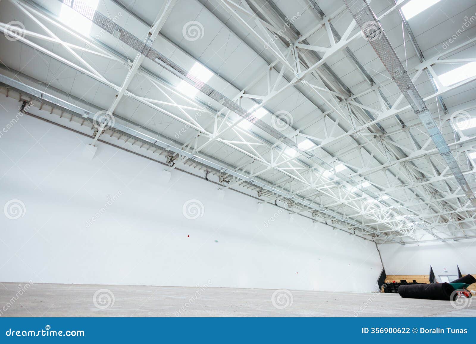 Empty Warehouse with White Walls and Ceiling Structure Showing Air ...