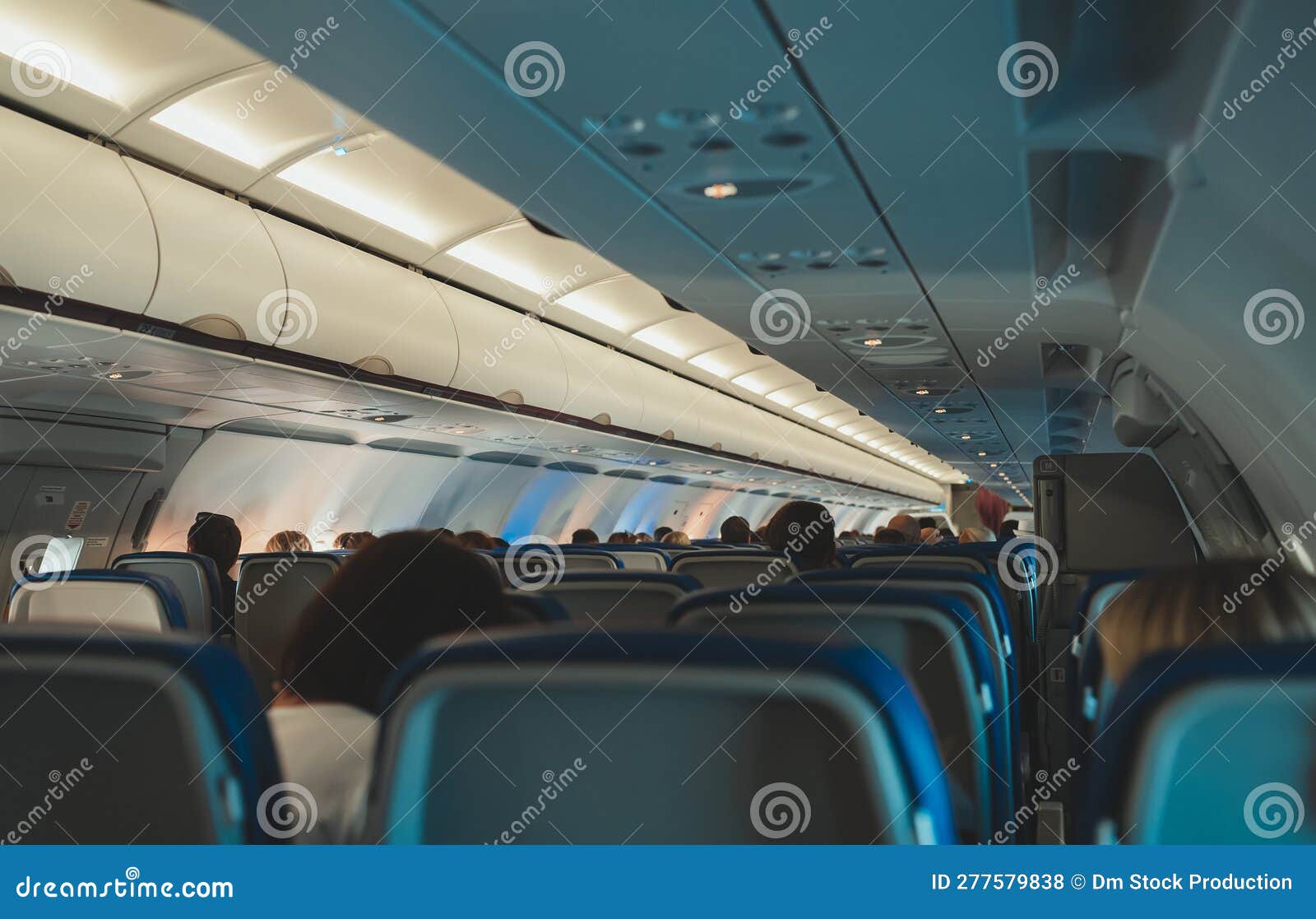 Plane with passengers stock photo. Image of chair, people - 277579838