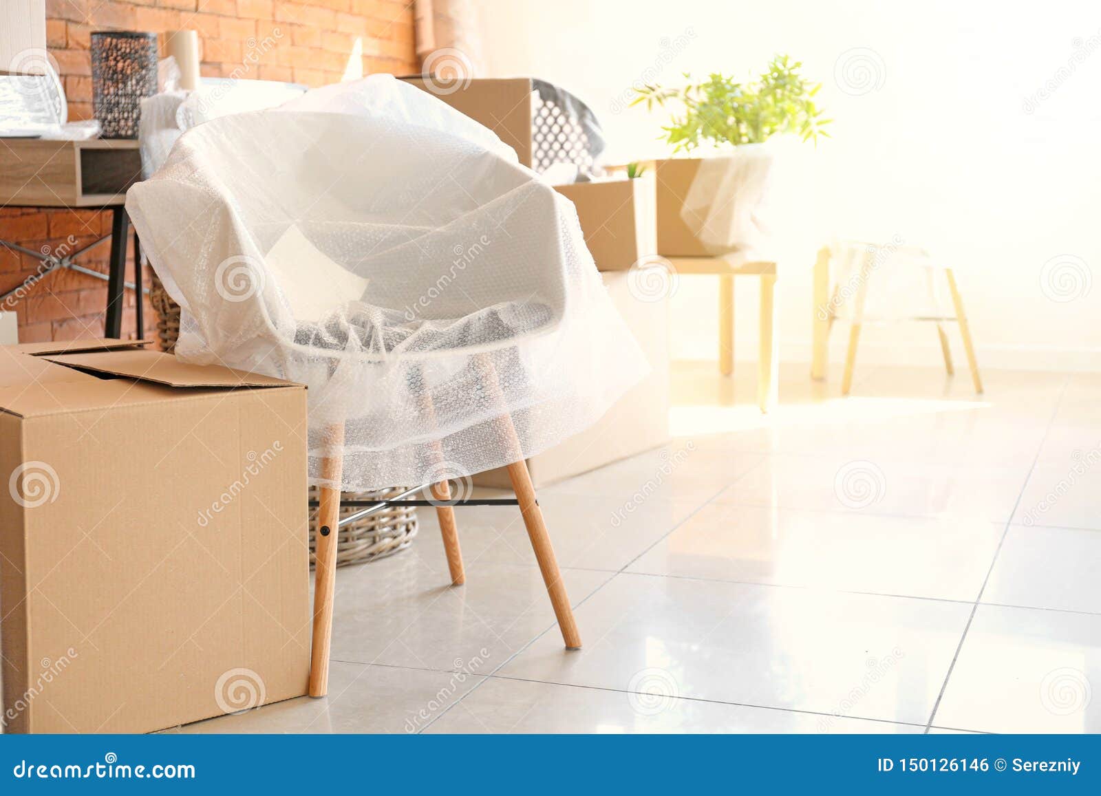 Interior Items and Packed Carton Boxes in Room. Moving House Concept ...