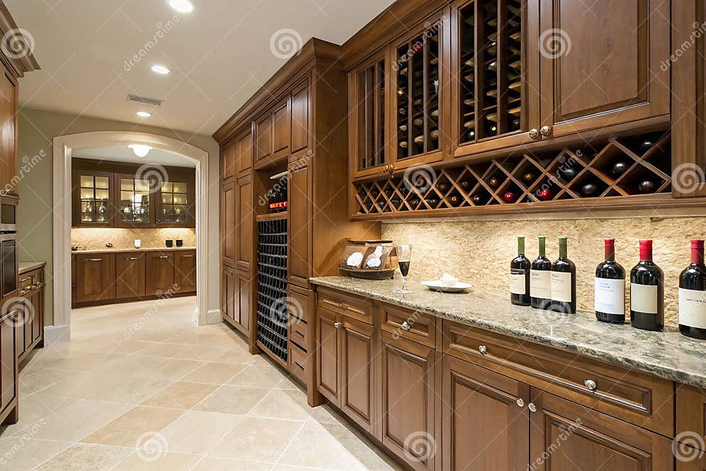 Interior of Kitchen with Wine. Kitchen with Rows of Wine Bottles in ...