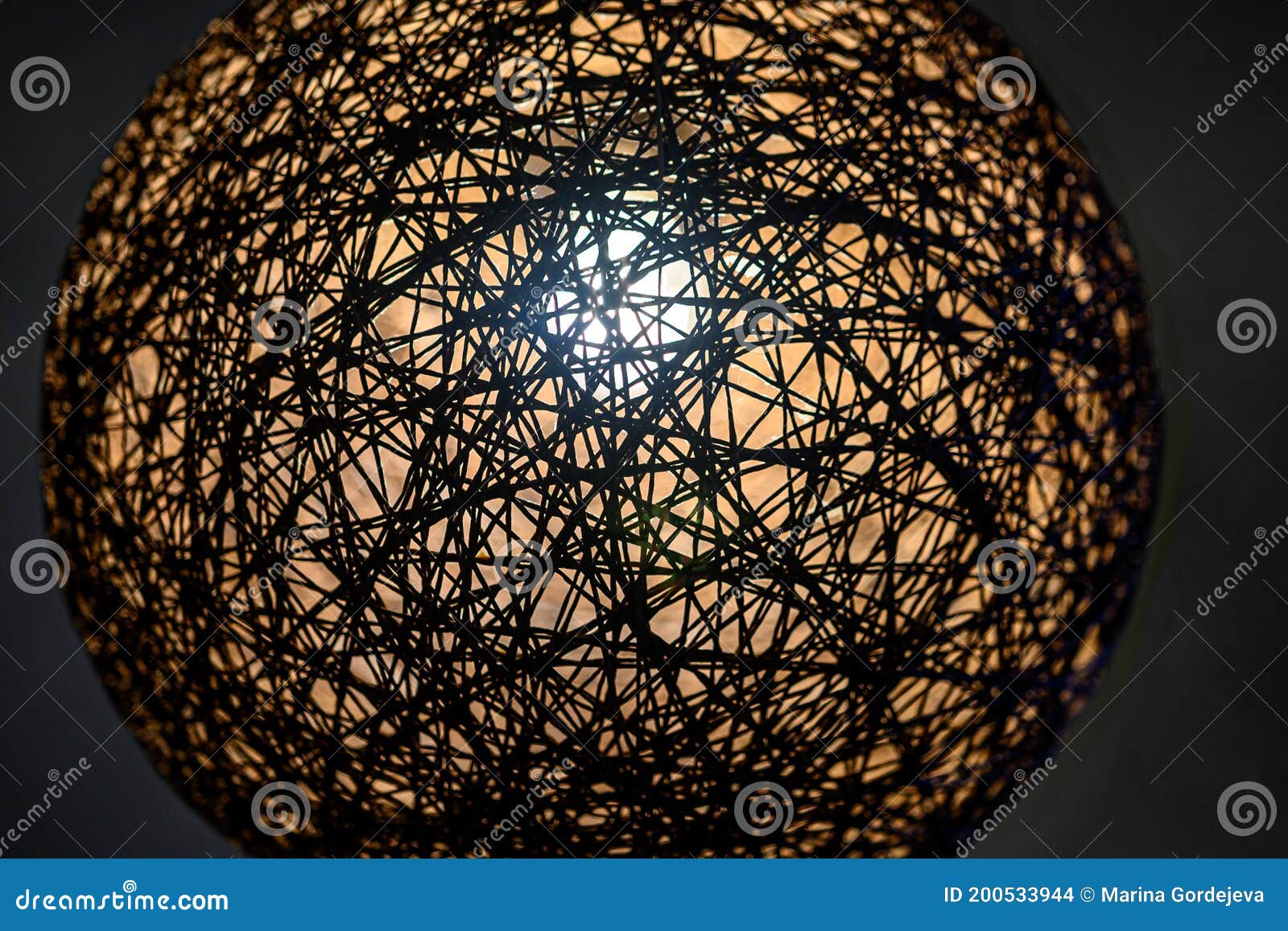 Interior Lighting is on. Round Decorative with Wicker Texture Over Lamp ...