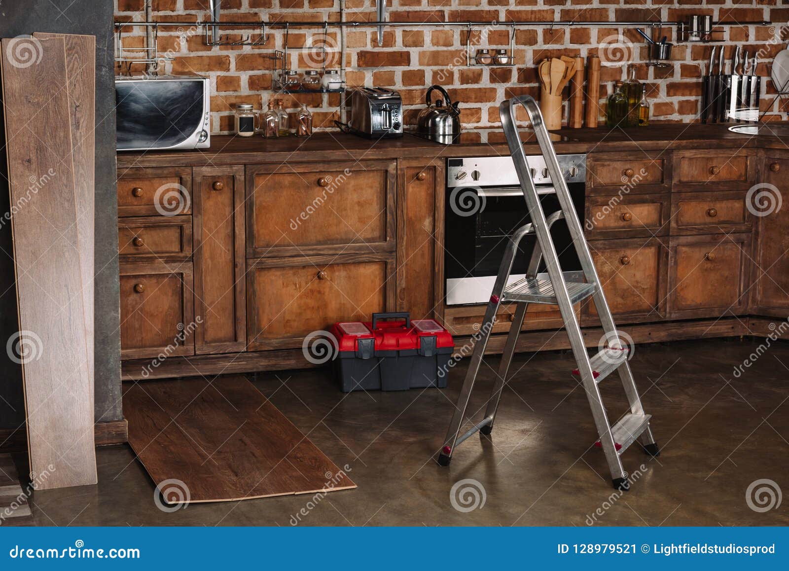 Interior of Loft Style Kitchen with Stepladder Toolbox and Laminate ...