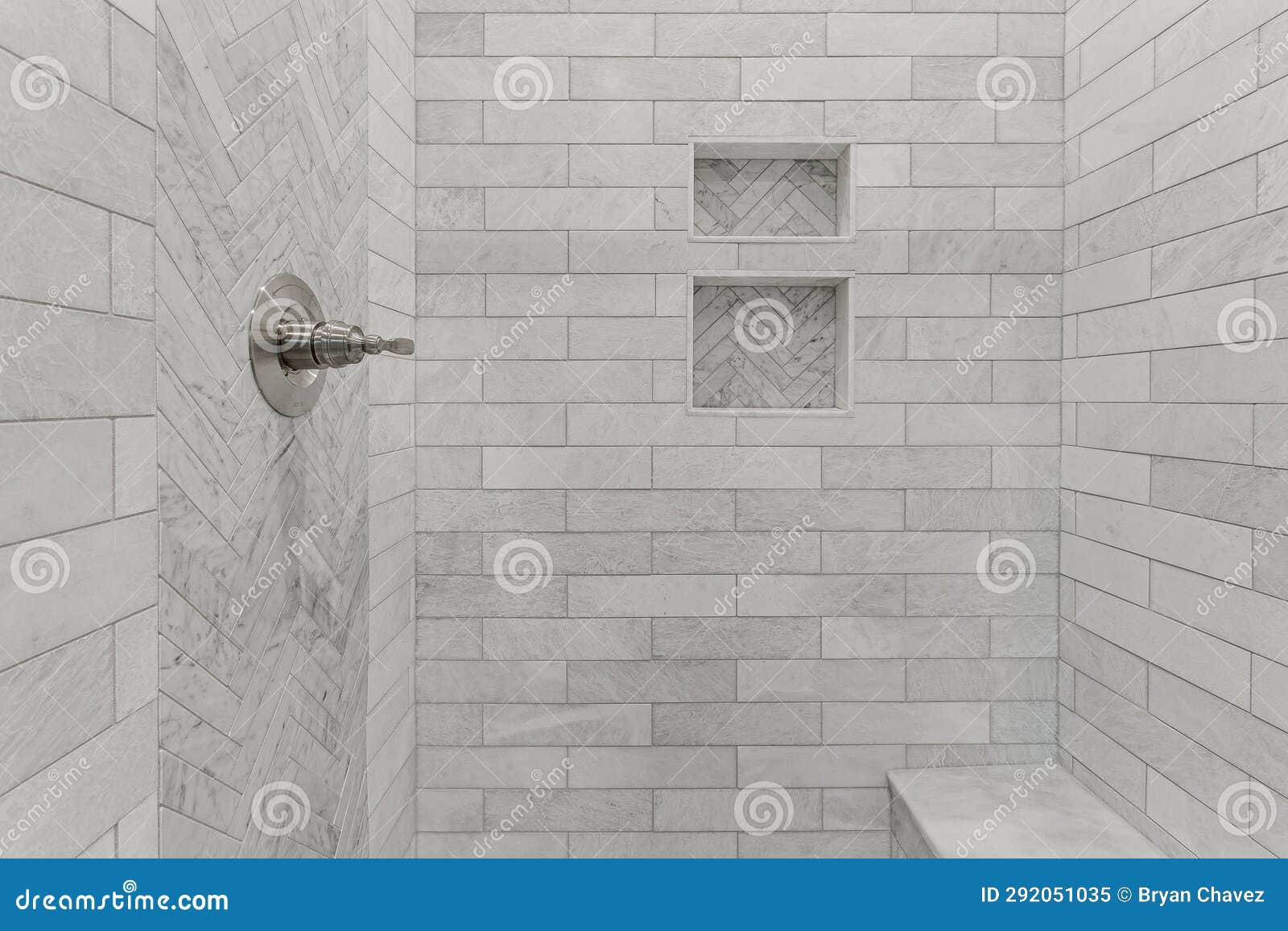 Interior of Luxury Bathroom Shower with Stone Tile and Built in Shelf ...