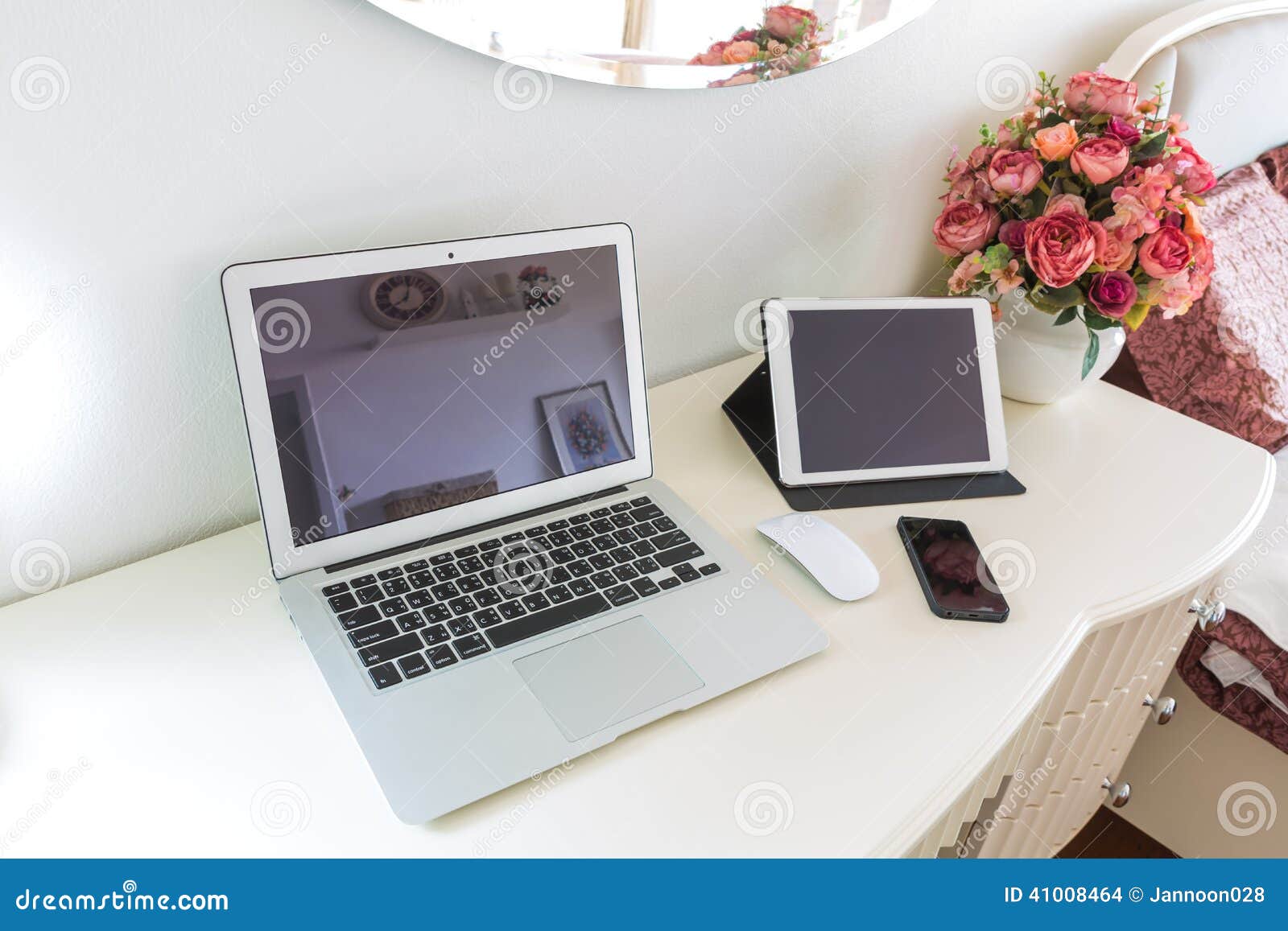 Interior of a Modern Bed Room with Laptop Computer, Tablet and Smart ...