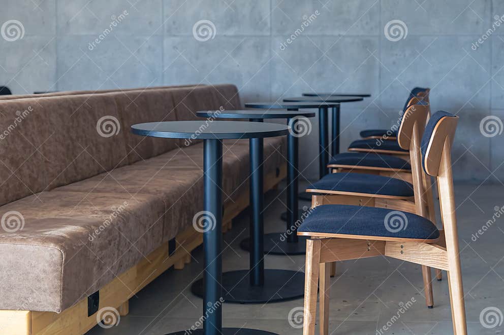 Interior of a Modern Cafe with Sofas, Chairs and Tables. Stock Image ...