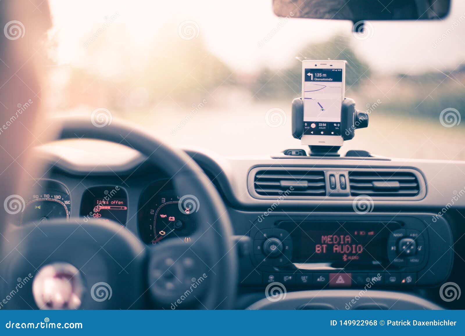 Interior of a Modern Car on a Sunny Day. Smartphone on Mobile Mount ...
