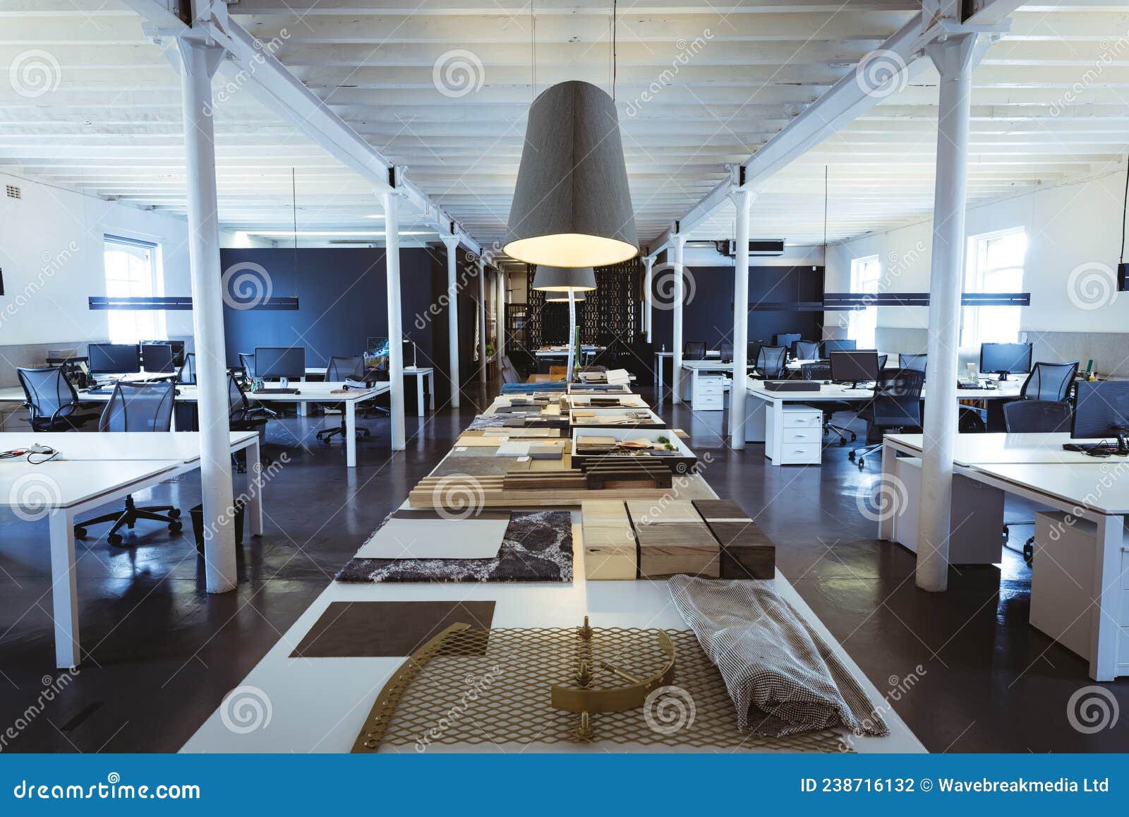 Interior of Modern Creative Office with Fabrics and Frames on Table ...