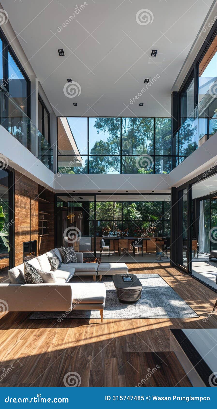 The Interior of a Modern House with a High Ceiling and Large Windows ...