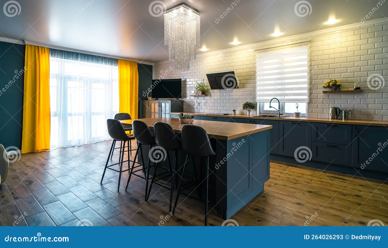 Interior of Modern Kitchen with Wooden Floor and Large Table in Center ...