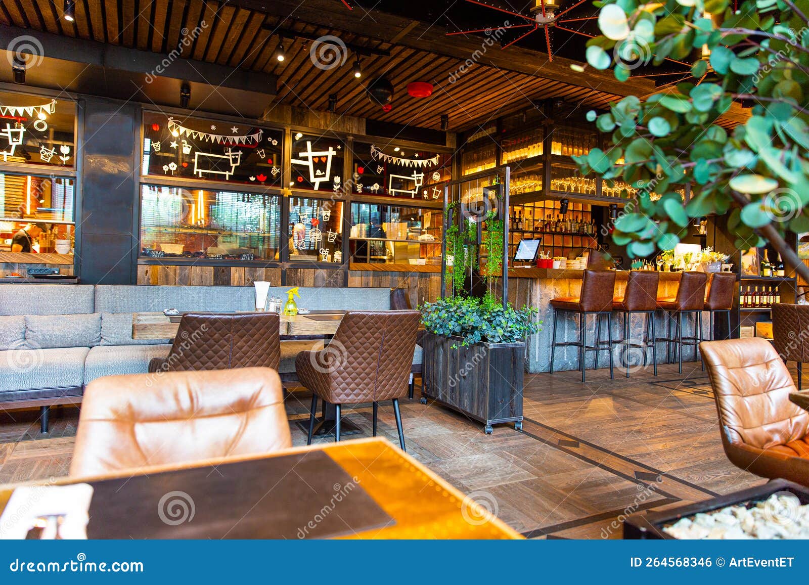 Interior of Modern Loft Style Restaurant with Live Plants Stock Photo ...
