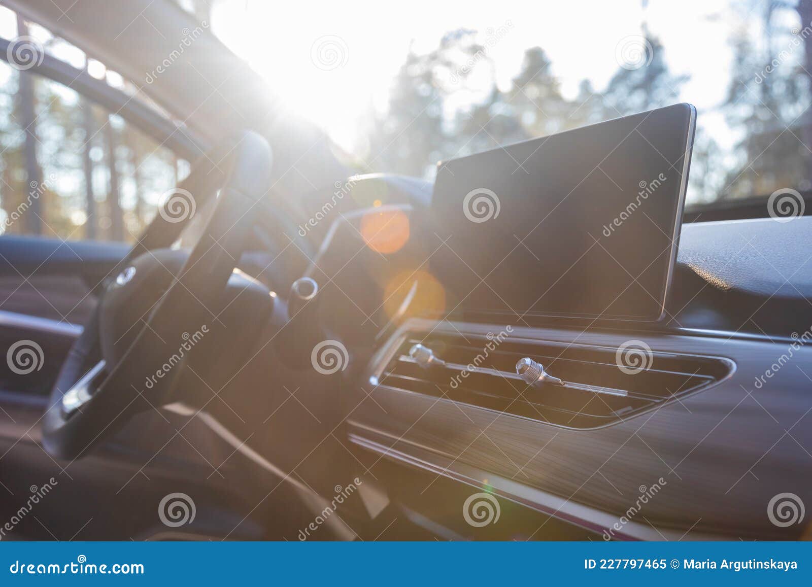 Interior of Modern Luxury Car in Sunshine. Monitor, Airduct and ... Interior of Modern Luxury Car in Sunshine. Monitor, Airduct and ...