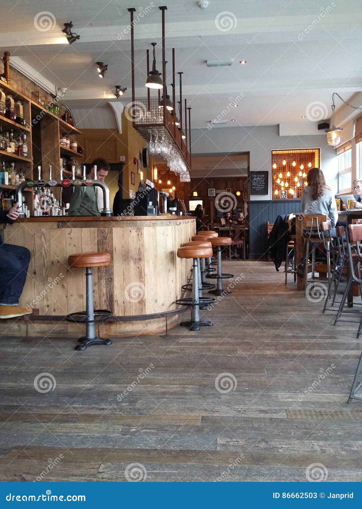 Interior of a modern pub editorial stock photo. Image of local - 86662503