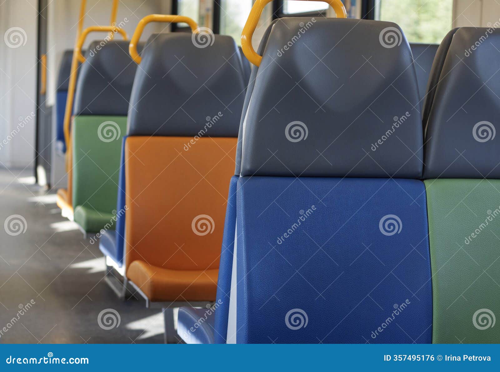 The Interior of a Modern Train with Rows of Seats and a Central Aisle ...