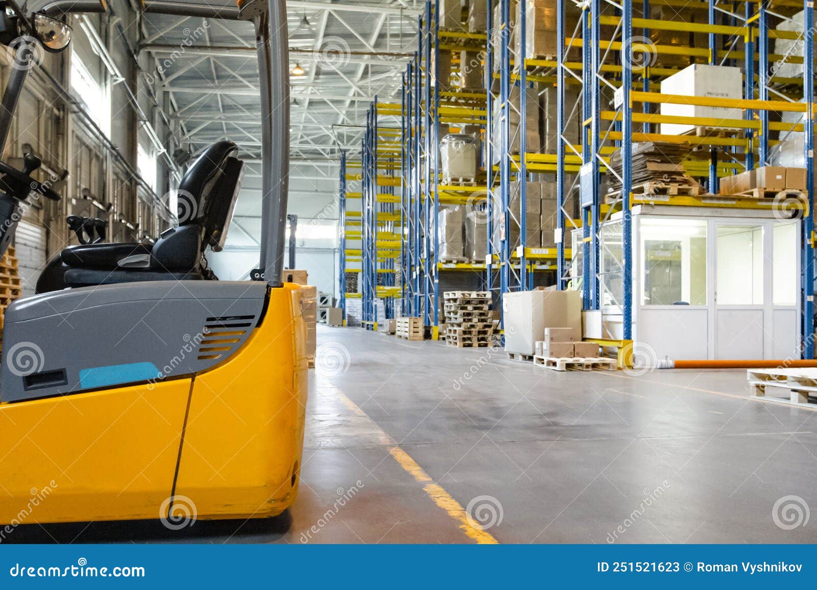 Interior of a Modern Warehouse with Forklifts. Pallet Stacker Truck ...