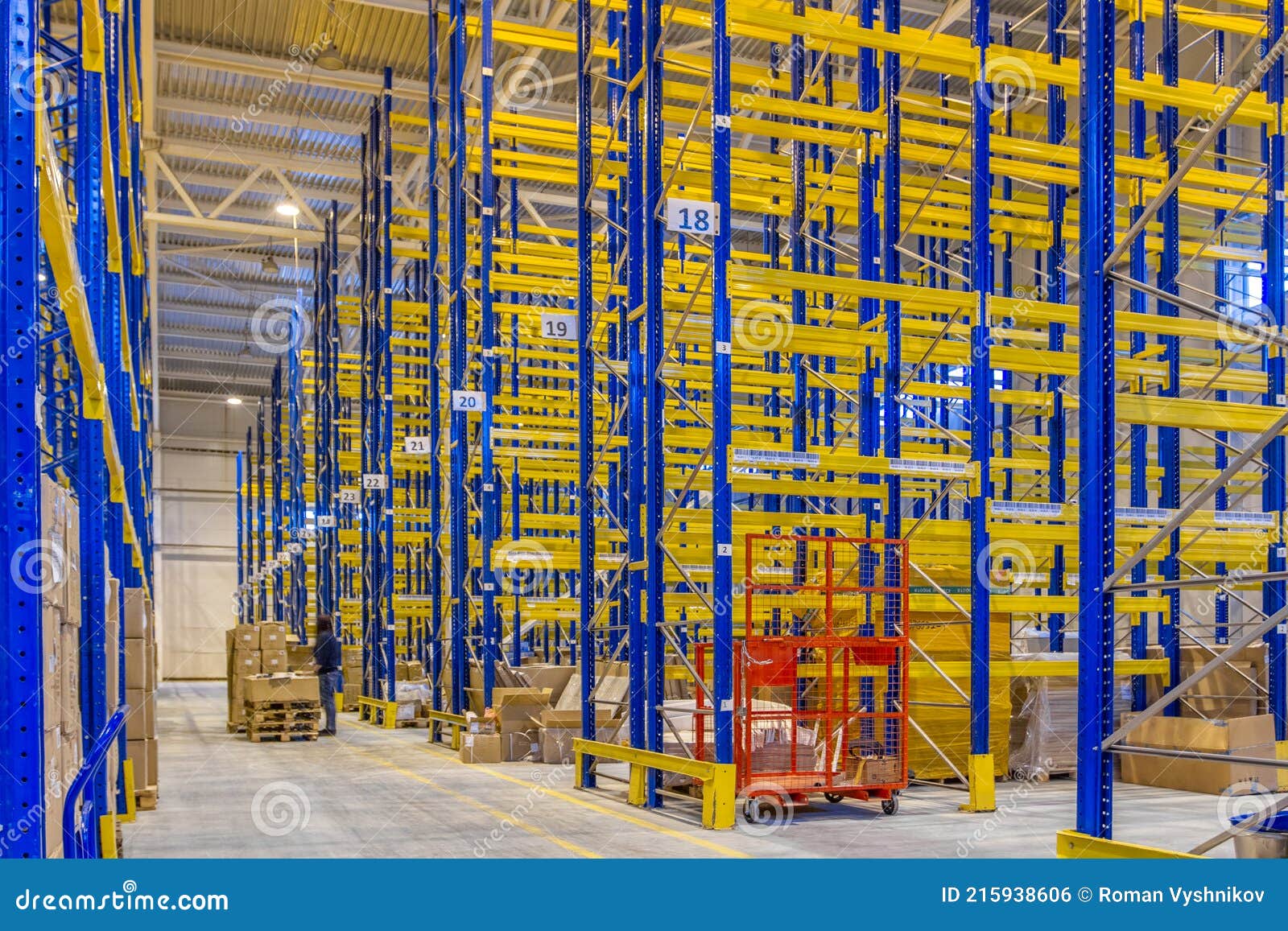 Interior of a Modern Warehouse Storage with Empty Rows and High Blue ...