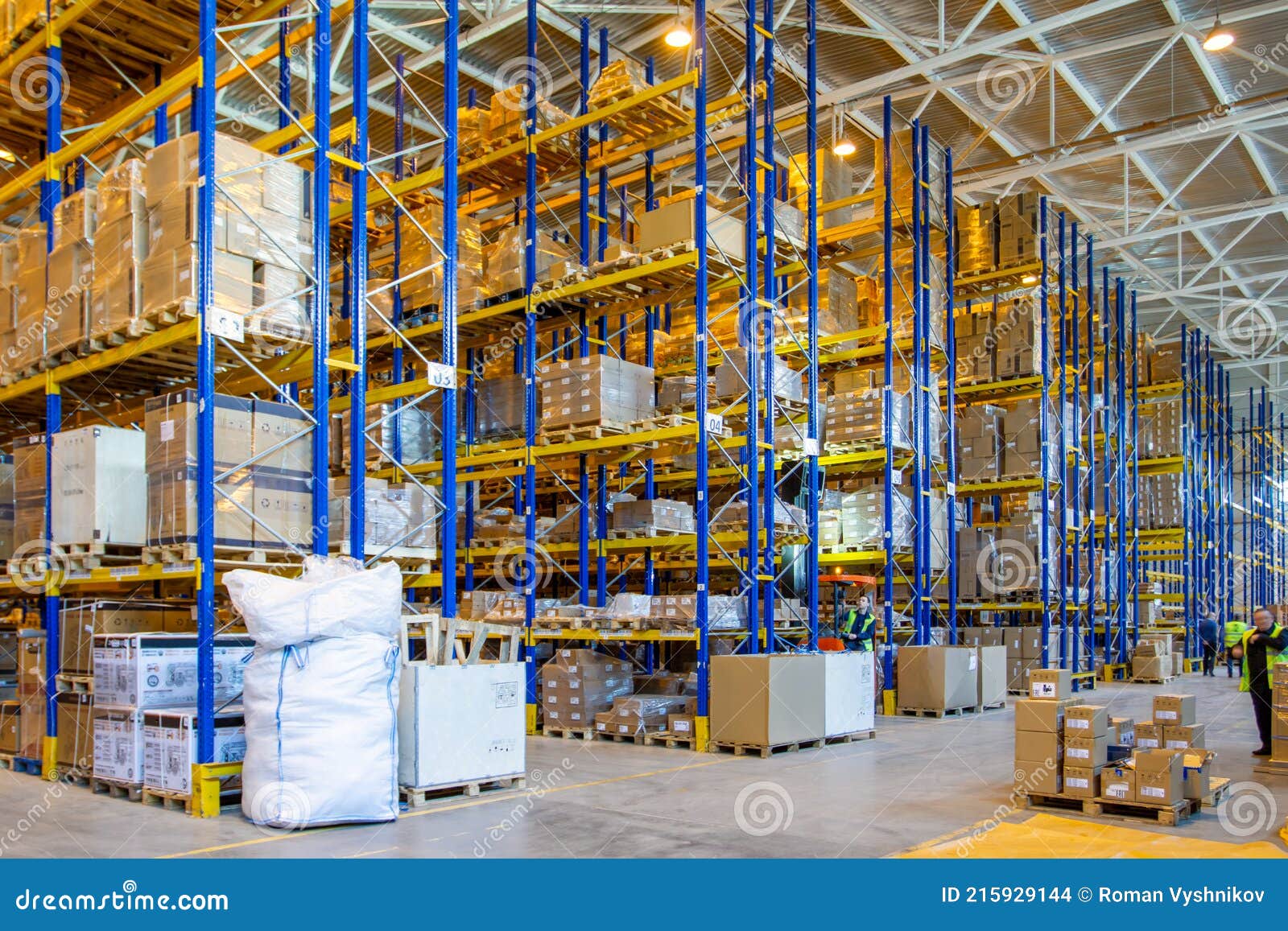 Interior of a Modern Warehouse Storage with Rows and Goods Boxes on ...