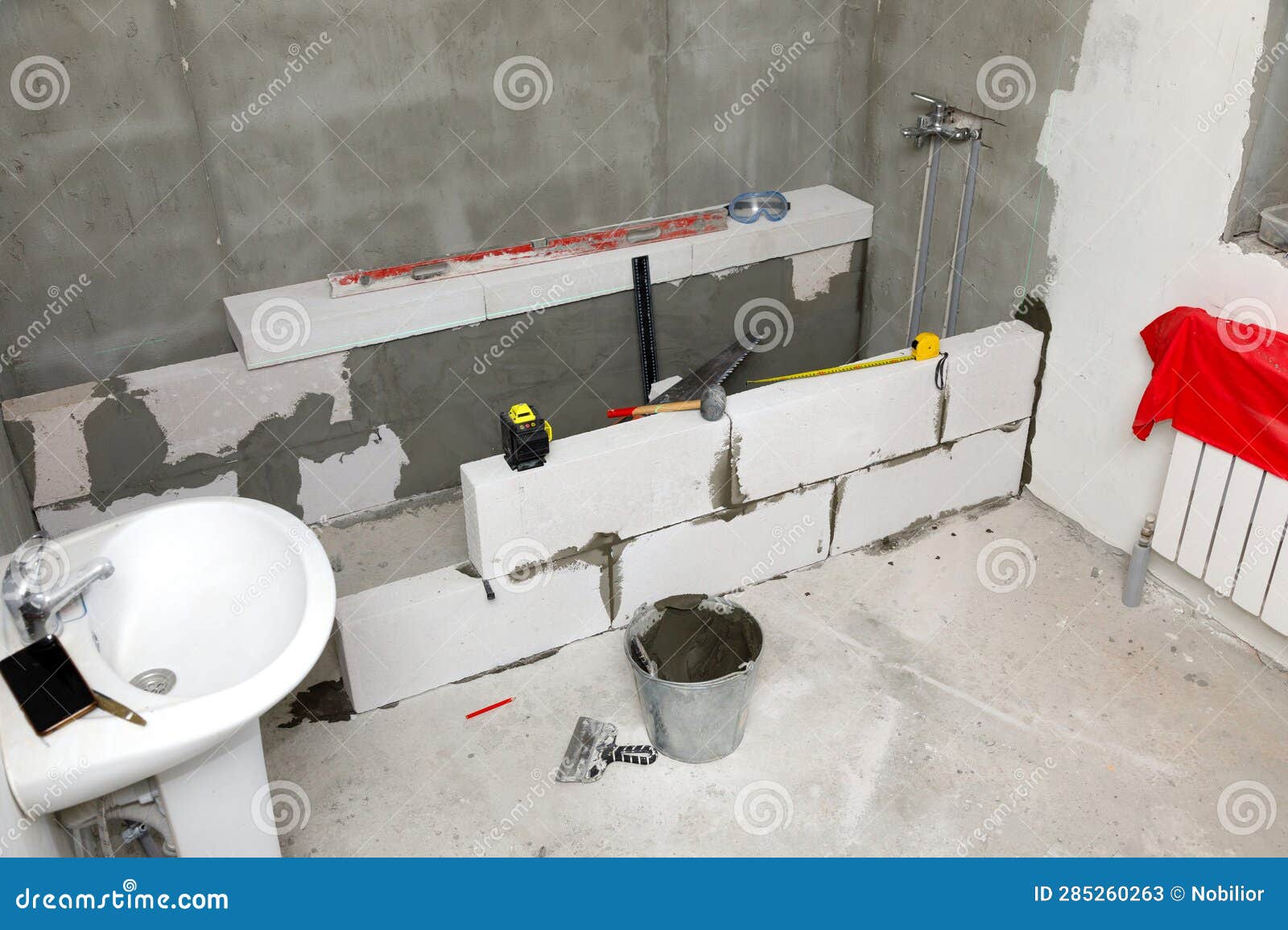 Interior of a New Bathroom with the Concrete Blocks and Construction ...