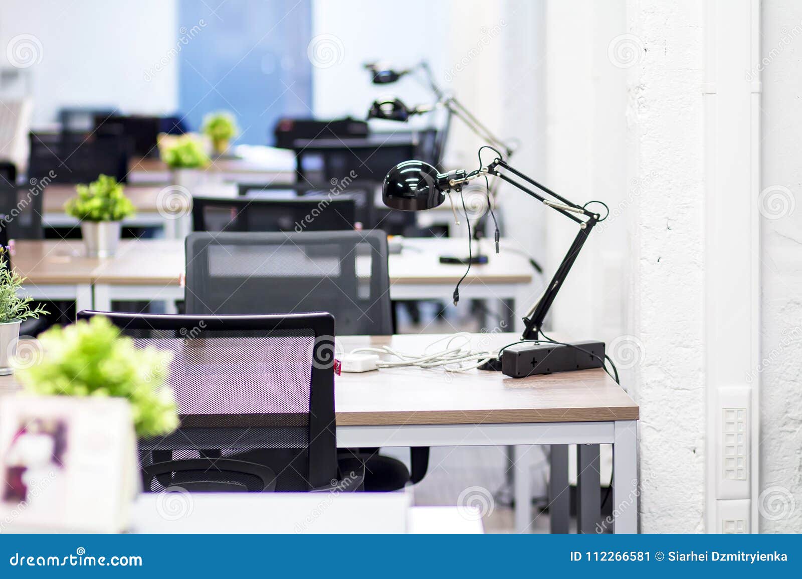 The Interior of the Office Premises of a Modern Company. Work Desks in ...