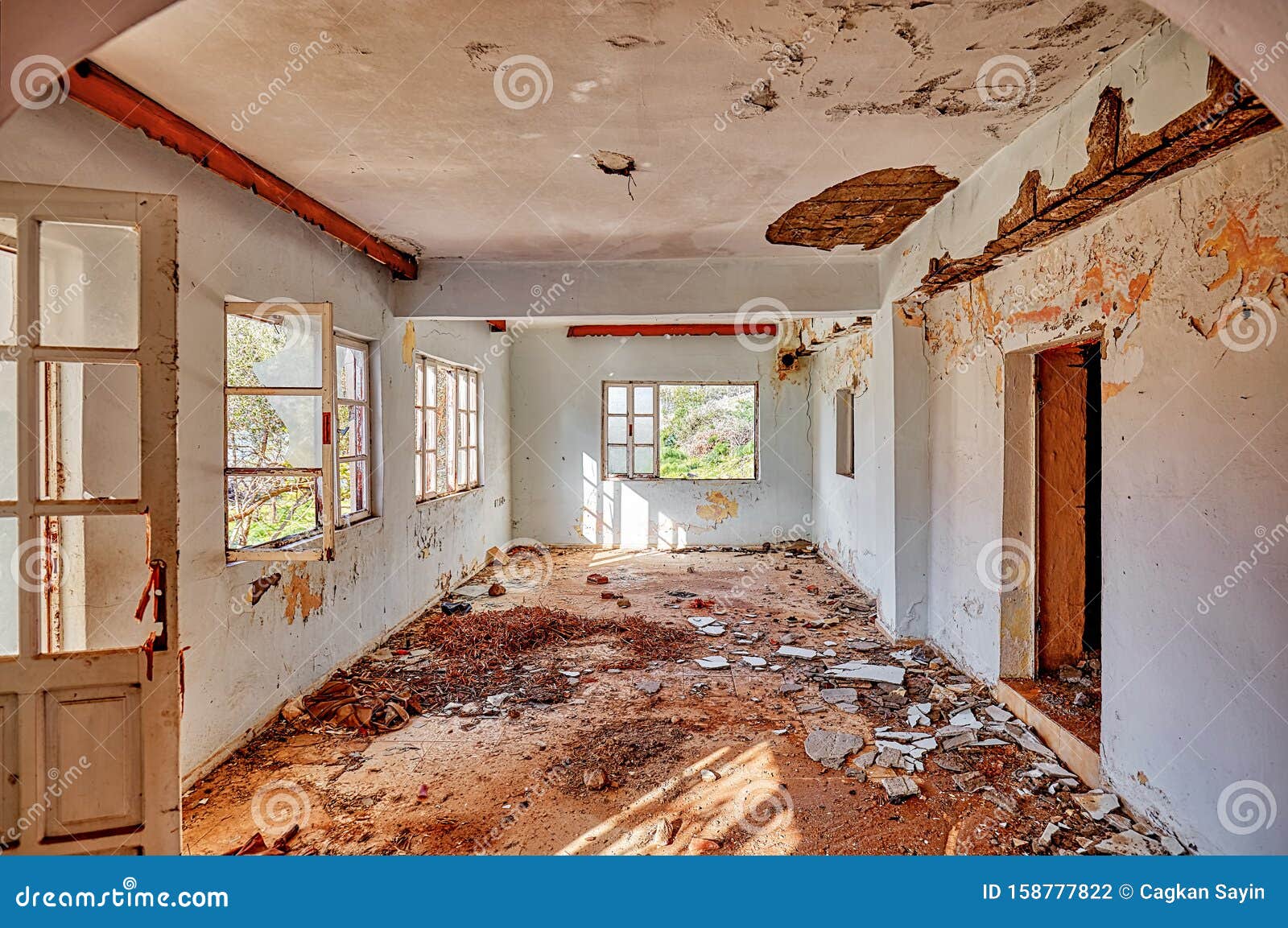 Interior of an Old Desolated House with White Cracked Walls and Windows ...