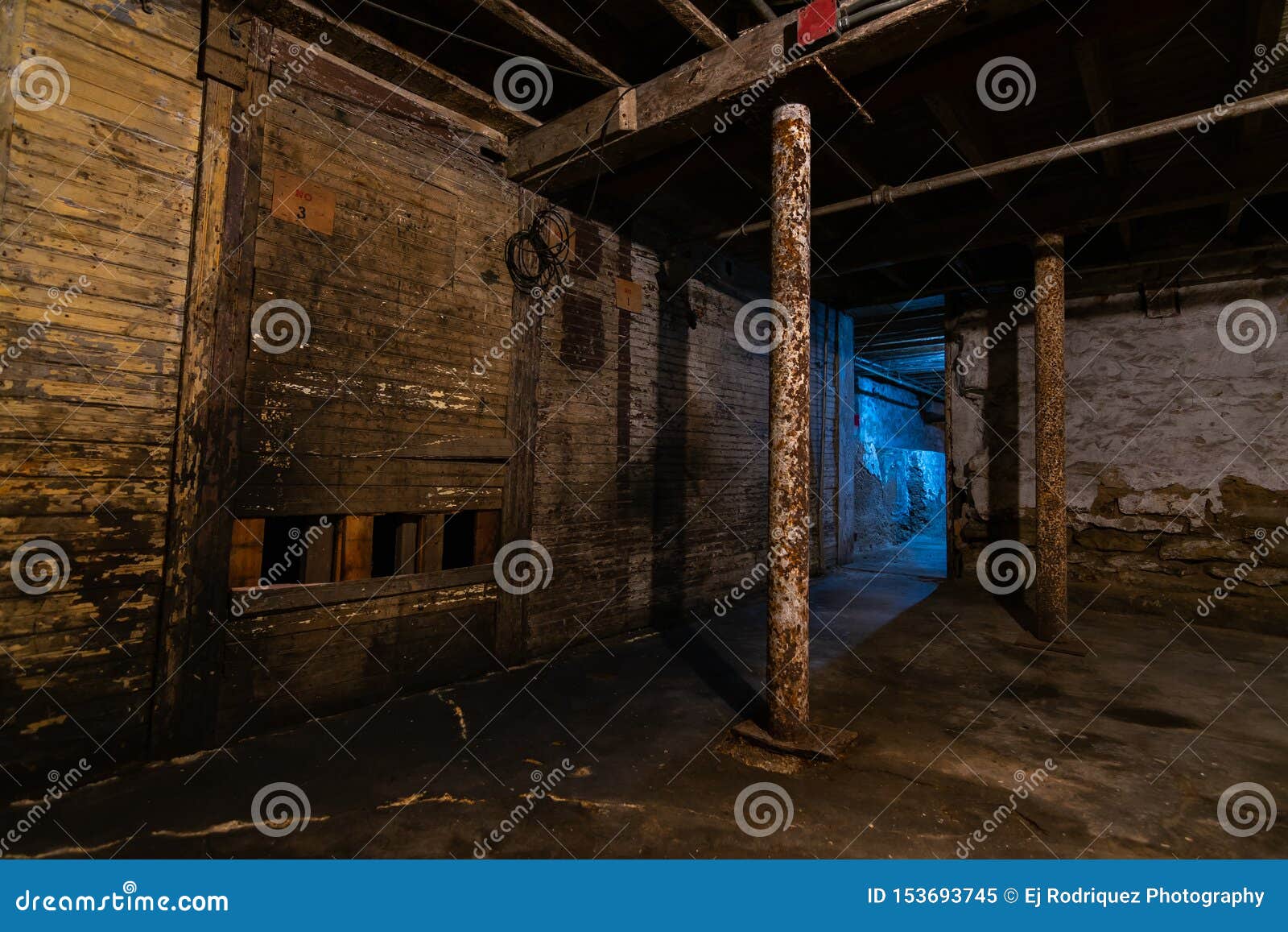 Grungy warehouse basement stock image. Image of interior - 153693745