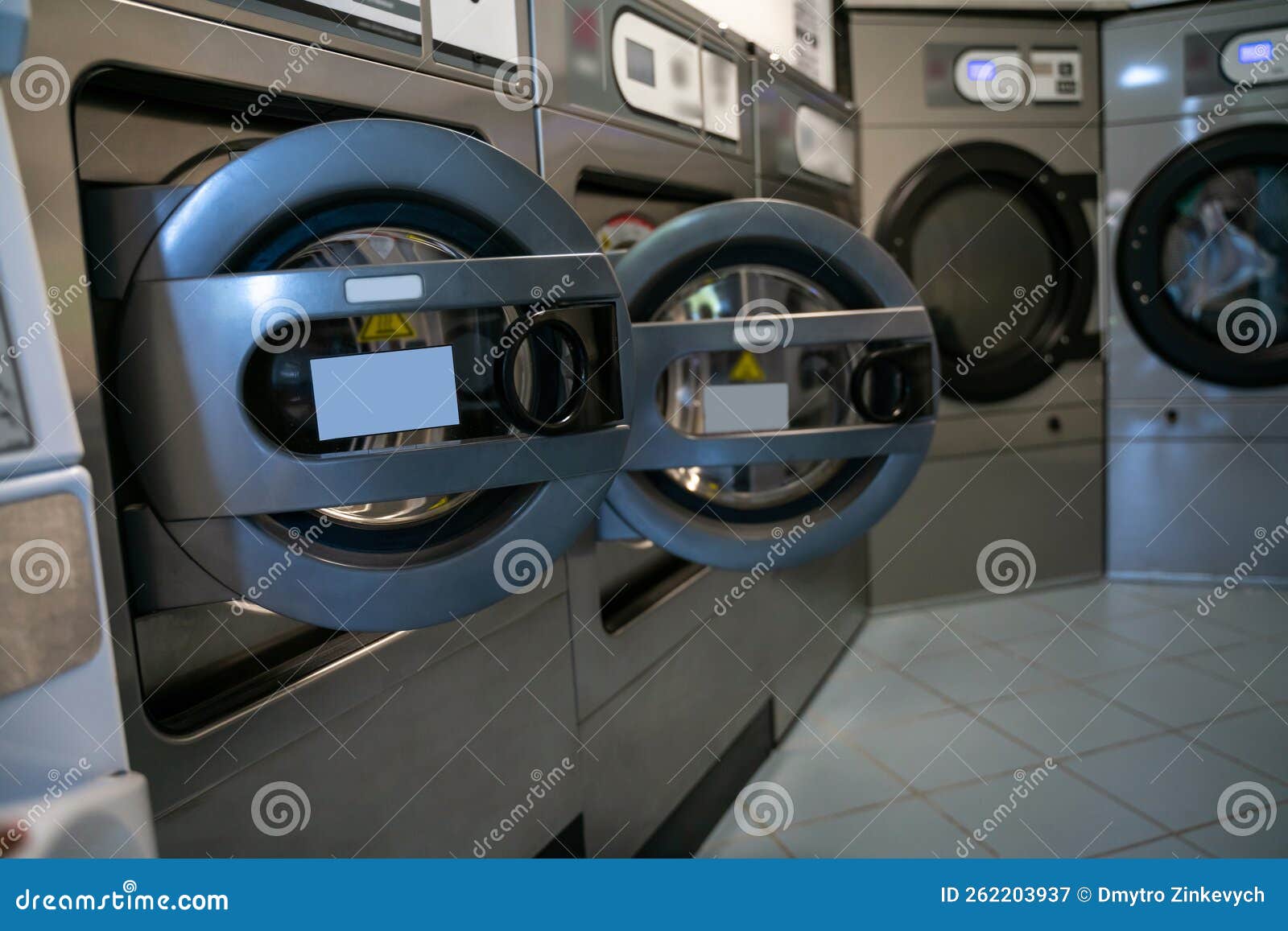 Shared Laundry Room with Several Front-loading Washing Machines Stock ...