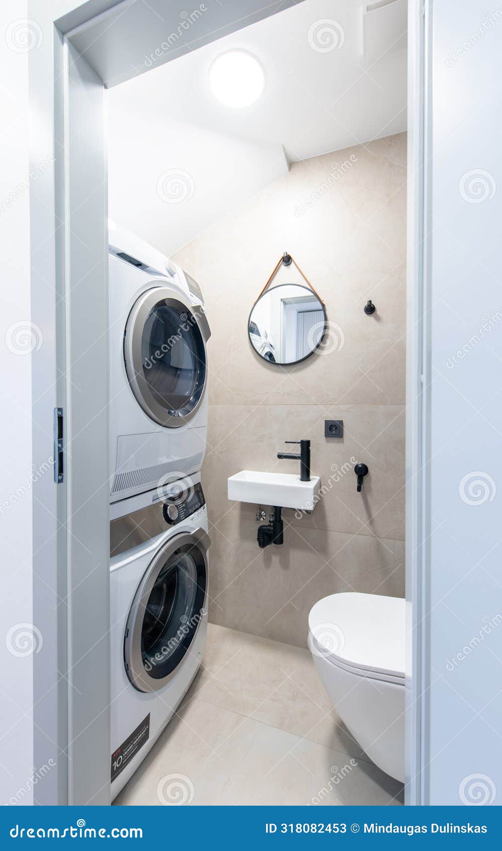 Interior of a Real Laundry Room with a Washing Machine at Home. a ...