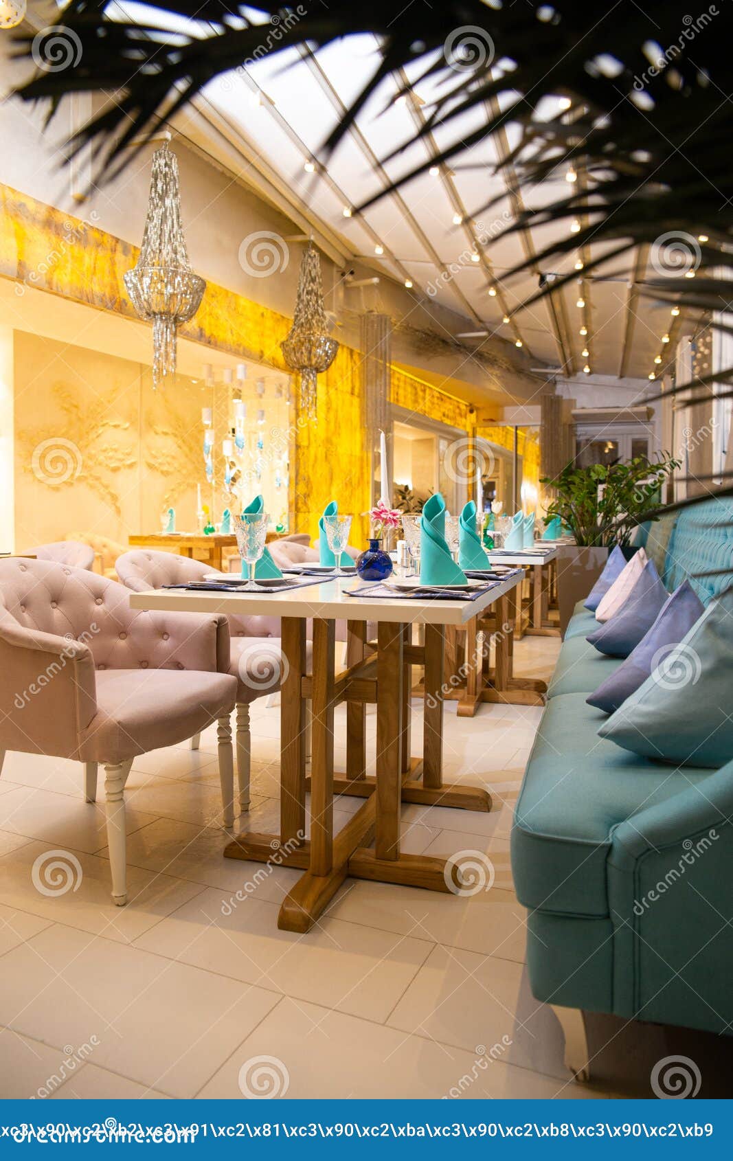 The Interior of the Restaurant in the Evening. Tables, Sofa and Chairs ...