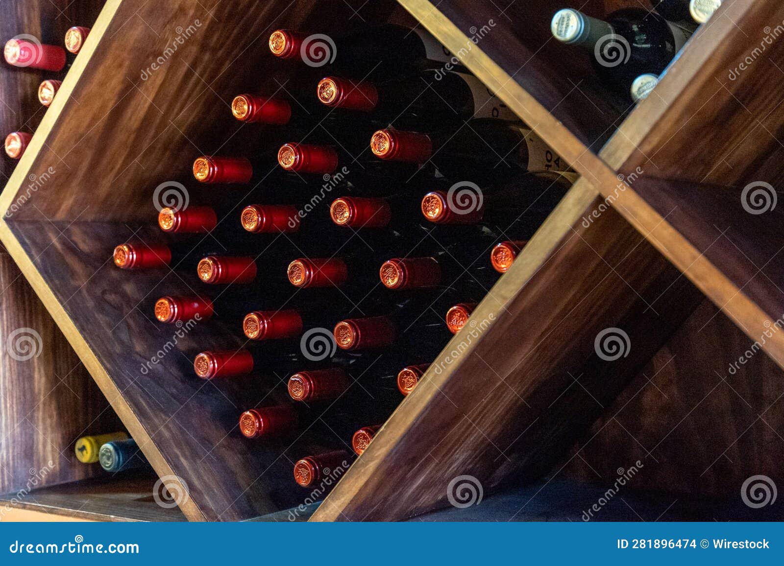 Interior Setting Featuring an Array of Different Wine Bottles on a ...