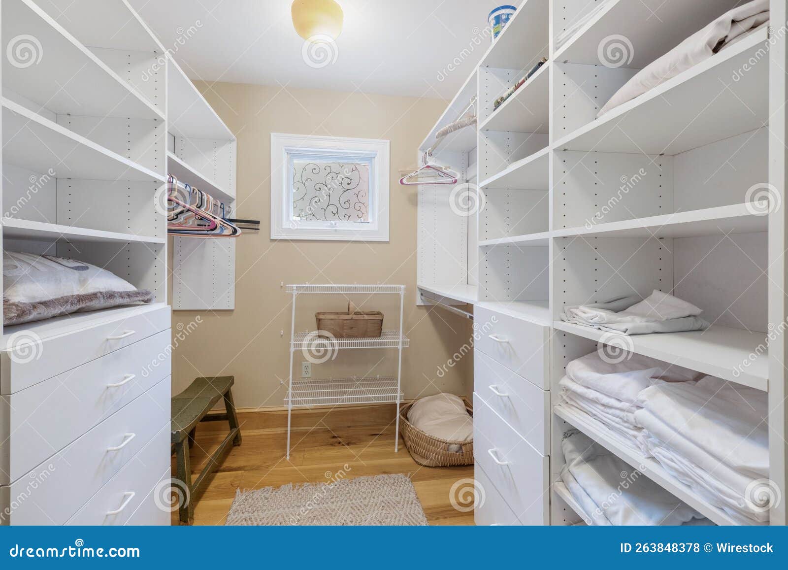 Interior Shot of a Closet with White Built-in Drawers. Stock Photo ...