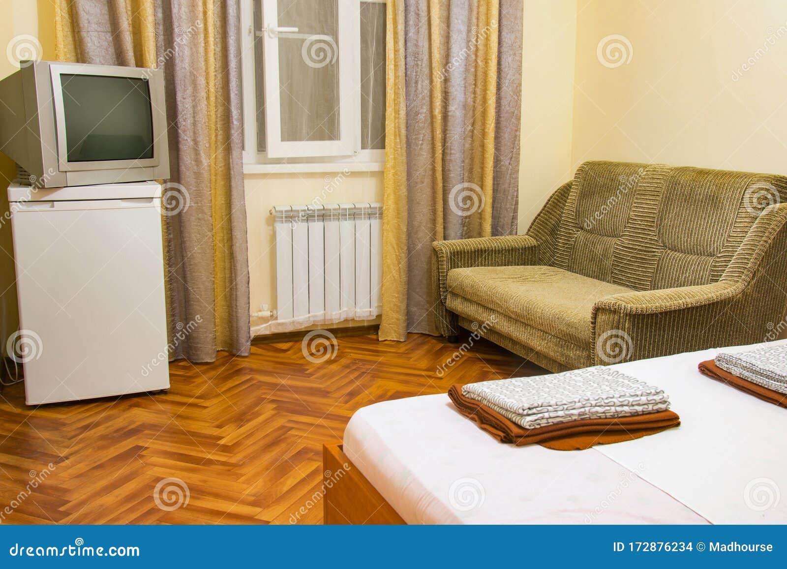 The Interior of a Small Hotel Room Stock Photo - Image of cosiness ...