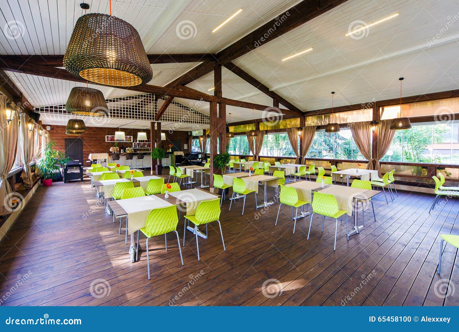 The Interior of the Summer Restaurant with Large Windows and Lot Stock ...