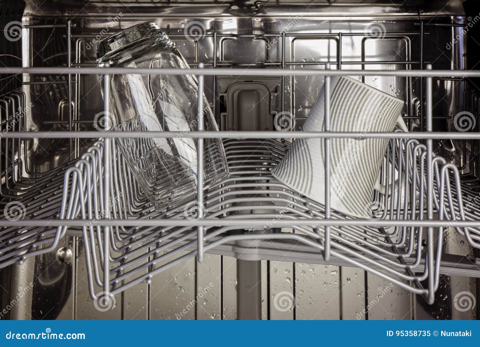 The Interior of the Top Rack of a Dishwasher Stock Image - Image of ...