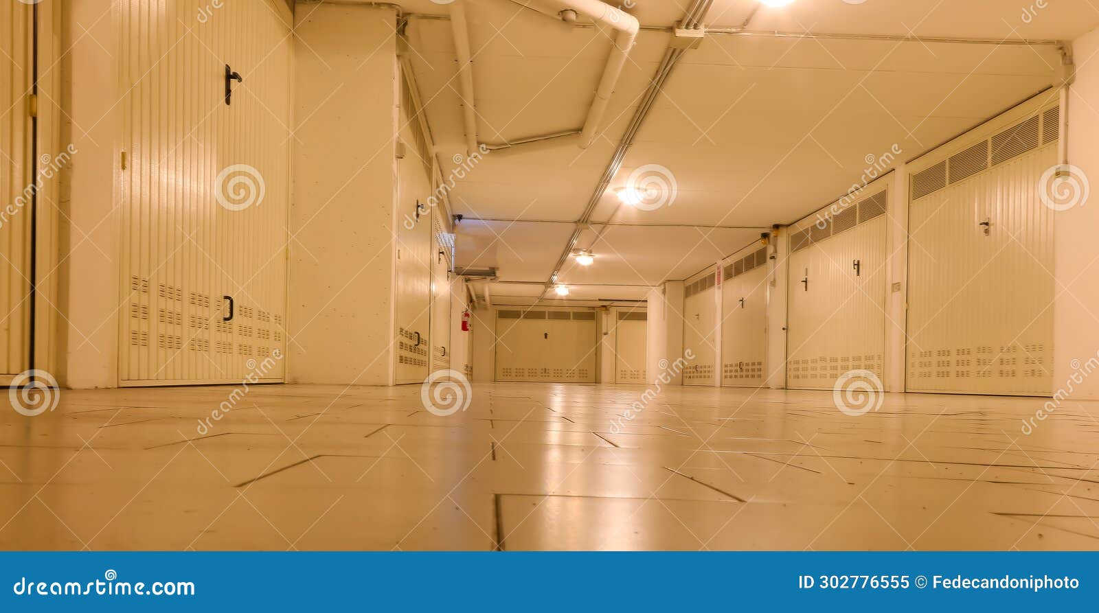 Underground Car Park with Garage Doors Under the Large Condominium ...