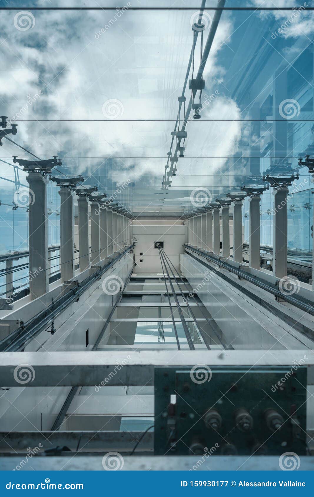 Interior View from Below of Modern Transparent Elevator or Lift with ...