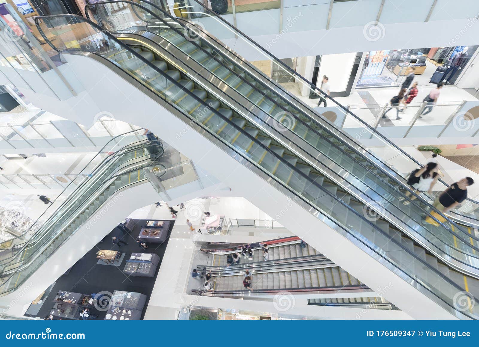 Escalator in shopping mall editorial photography. Image of outlet ...