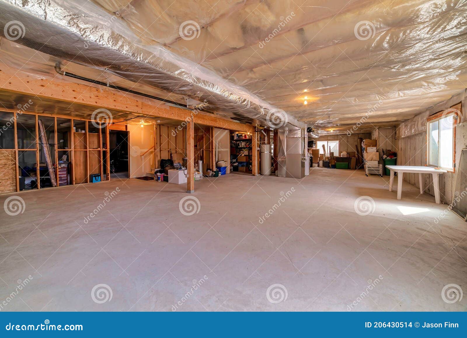Interior View of a House Under Construction with Plastic Cover on the ...