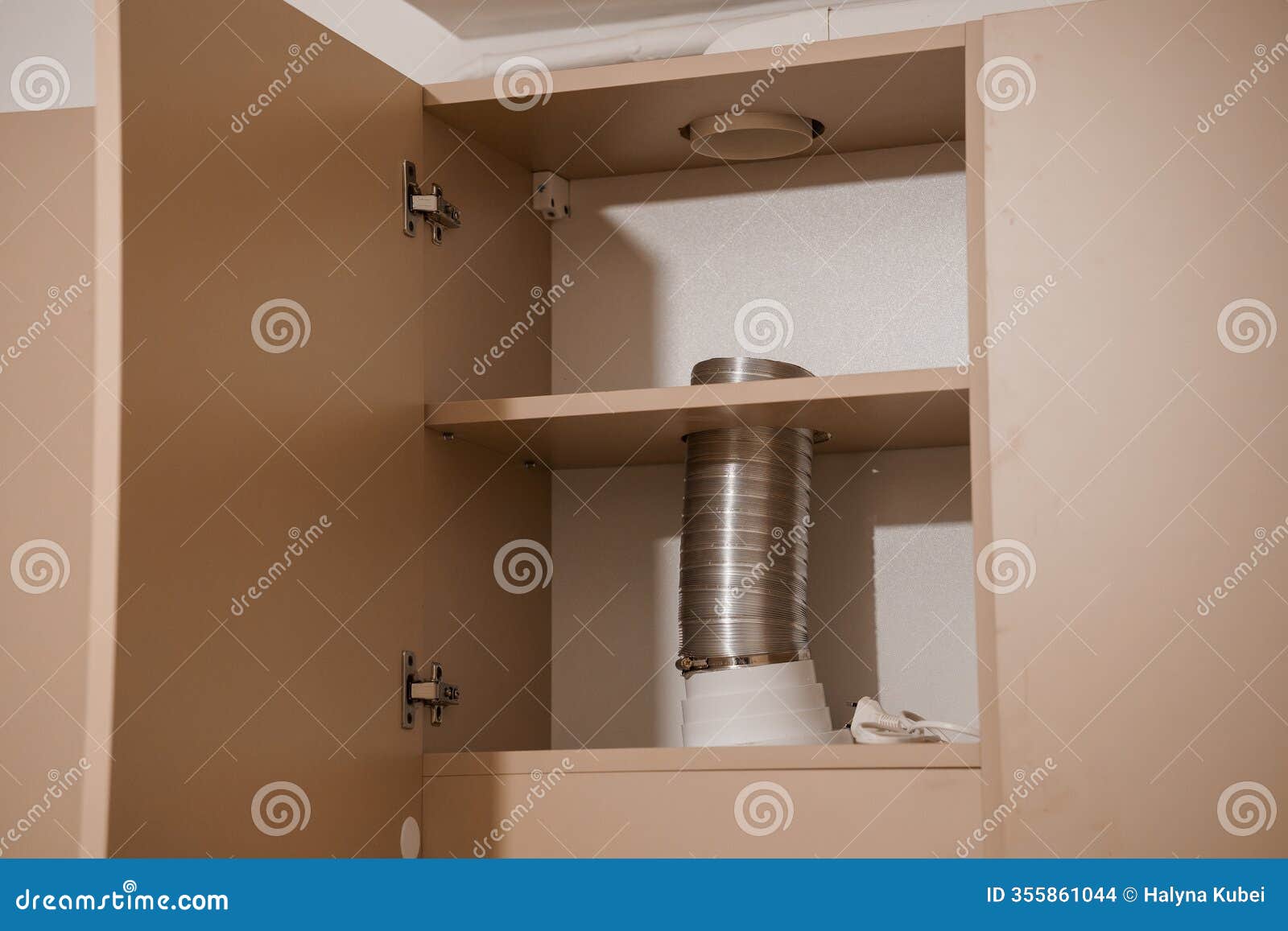 Interior View of a Kitchen Cabinet Featuring a Ventilation Duct Stock ...