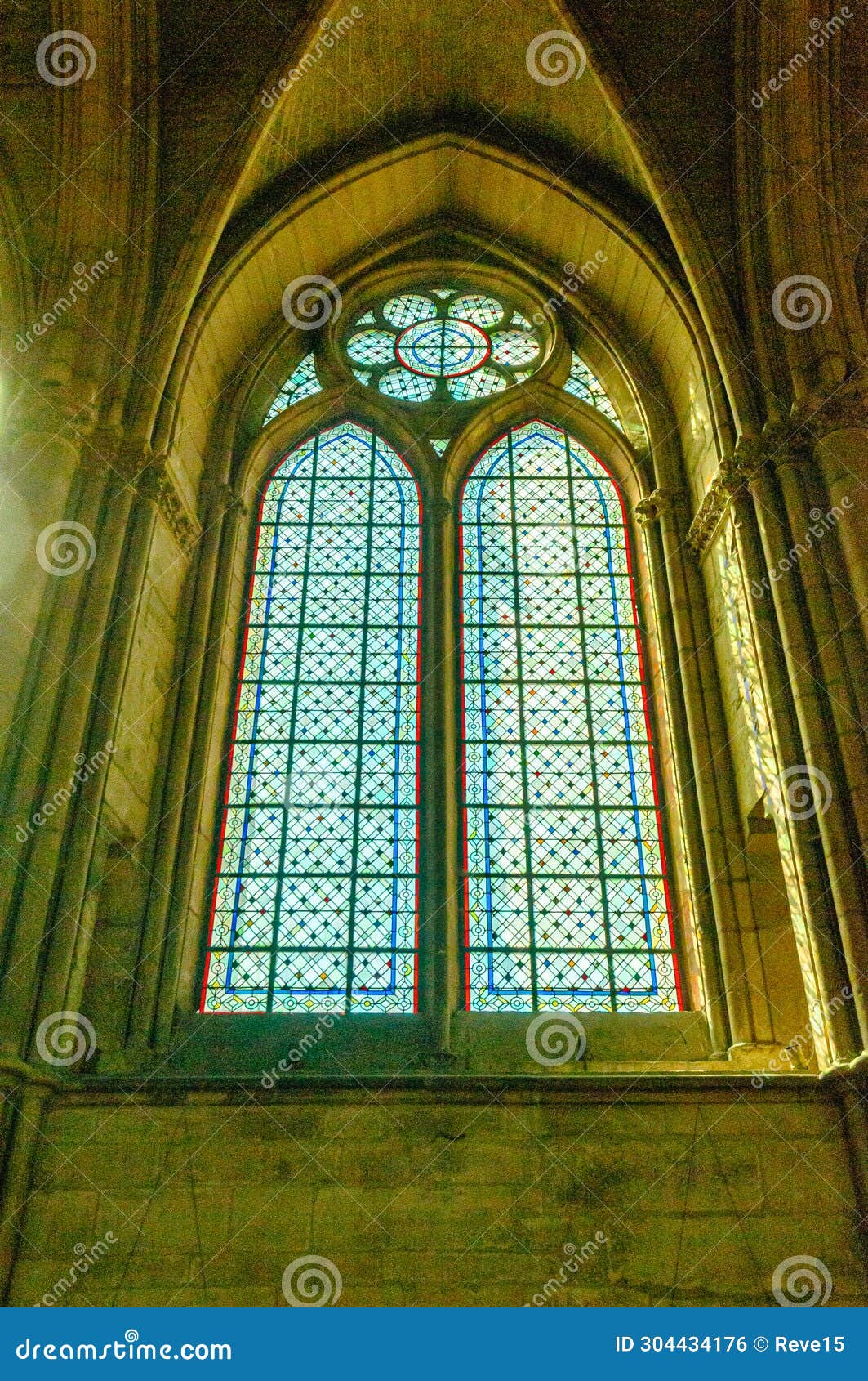 Interior View of a Pair of, Tall Stained Glass Window in Limestone ...