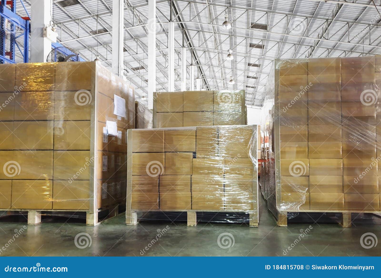 Stack Of Package Boxes On Wooden Pallet At Storage Warehouse. Carton ...