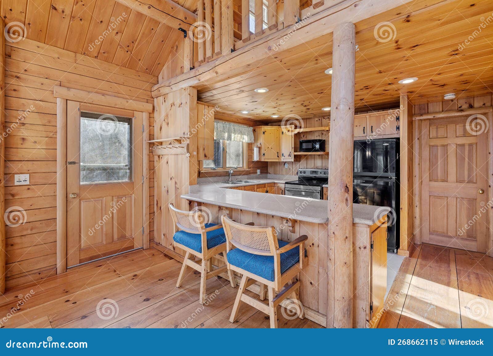 Interior of a wooden house stock image. Image of chairs - 268662115