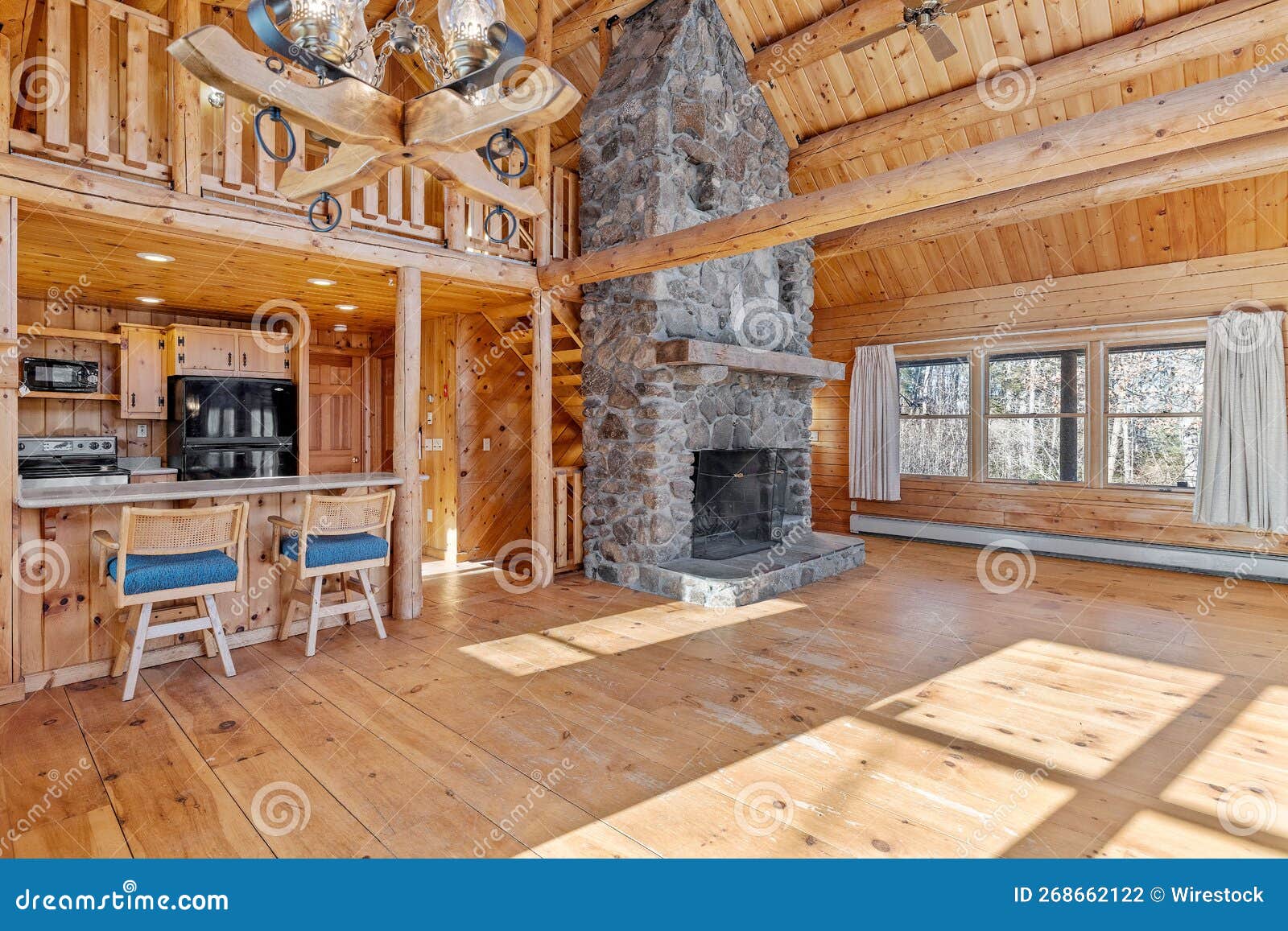 Interior of a wooden house stock photo. Image of furniture - 268662122